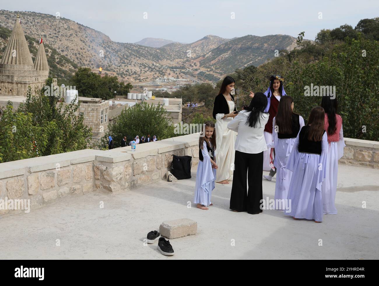 Yazidi family members at the mountain temple of Lalish in Iraq Stock ...
