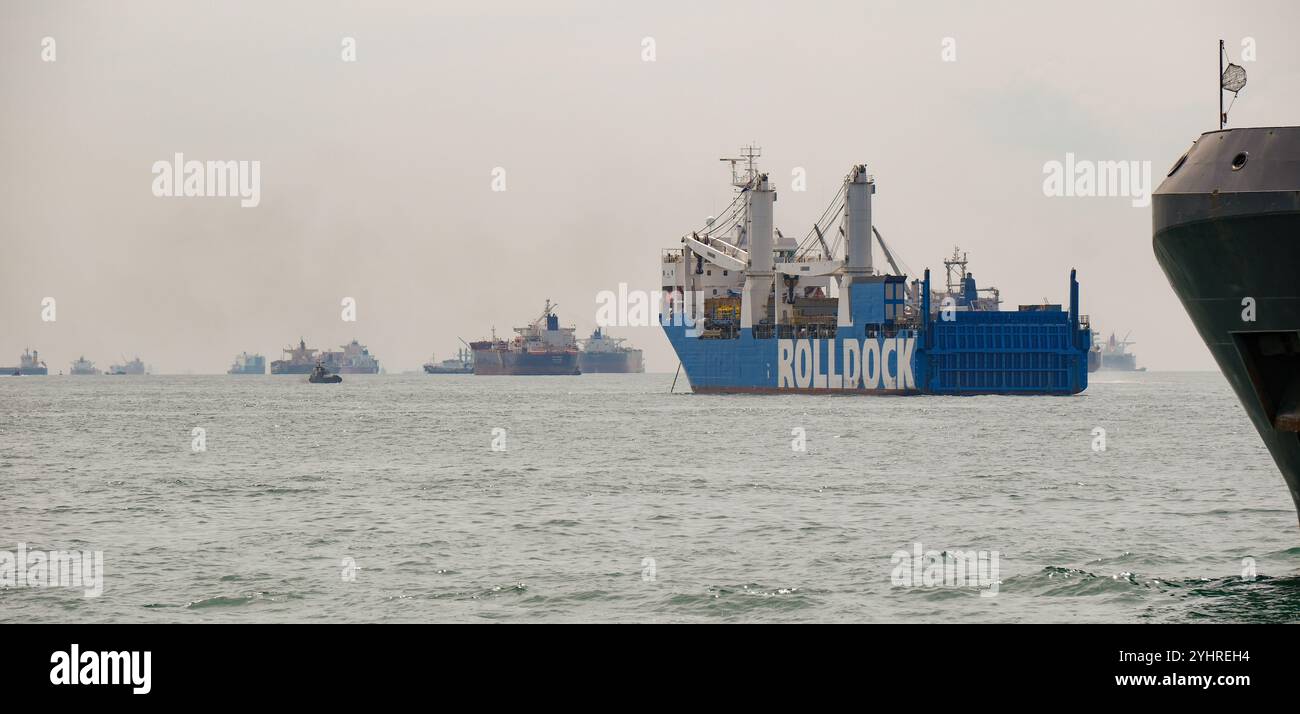 The Heavy Load Carrier Rolldock Star sits anchored off Singapore in the ...