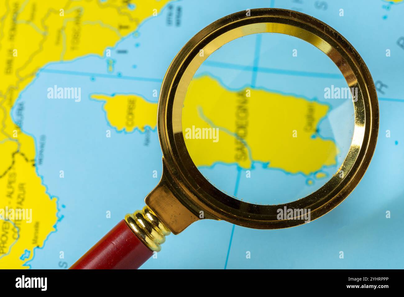 Magnifying glass and map Stock Photo - Alamy