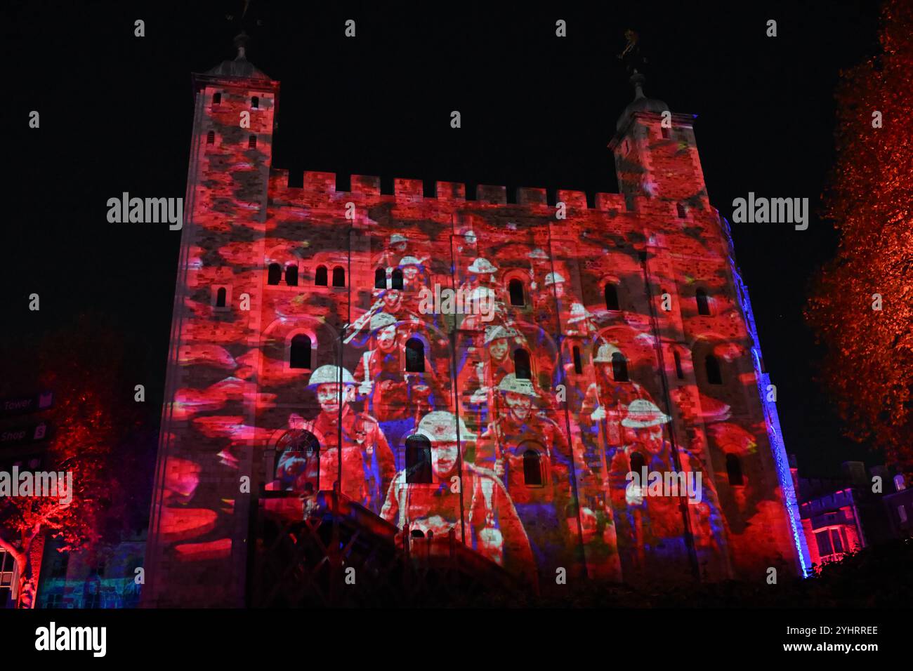 The White Tower keep in the Tower of London lit up during the Poppy ...