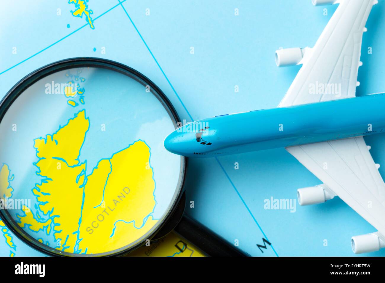 Magnifying glass and map Stock Photo - Alamy