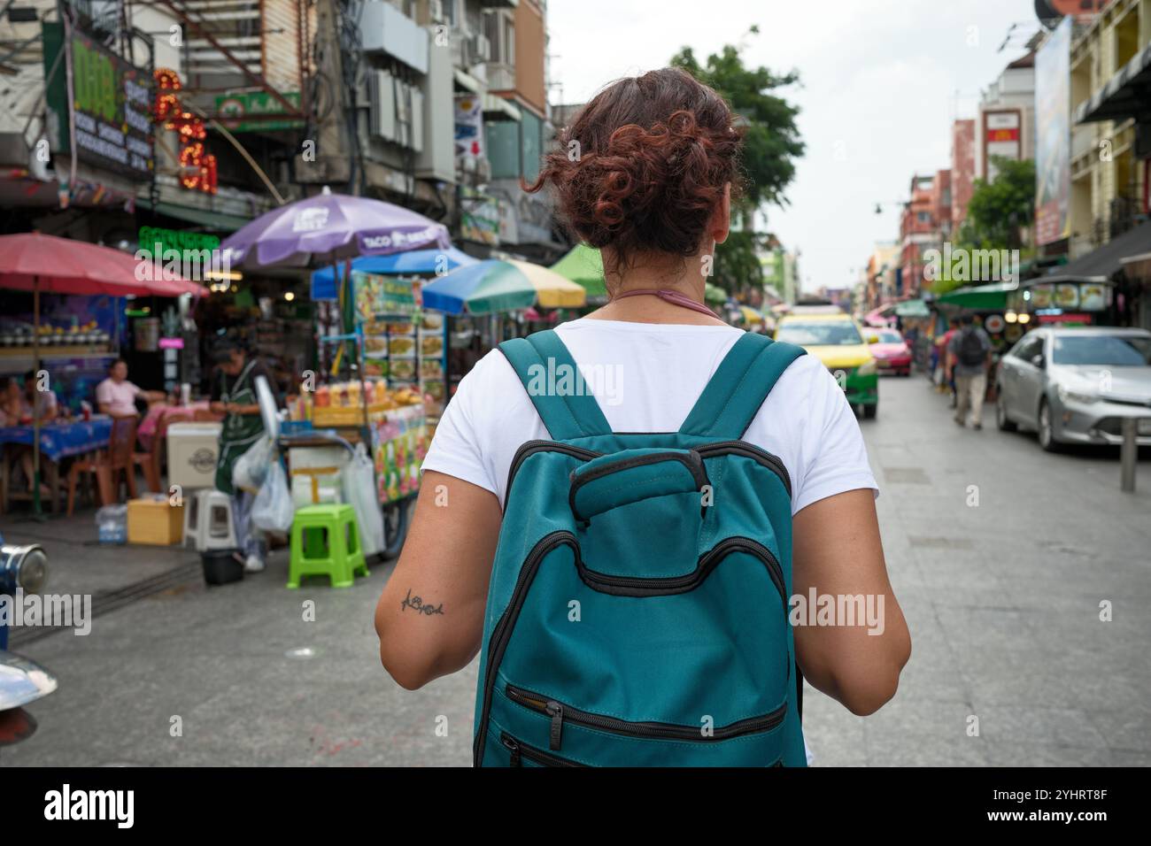 Tourist walking in bangkok street market exploring local culture Stock ...