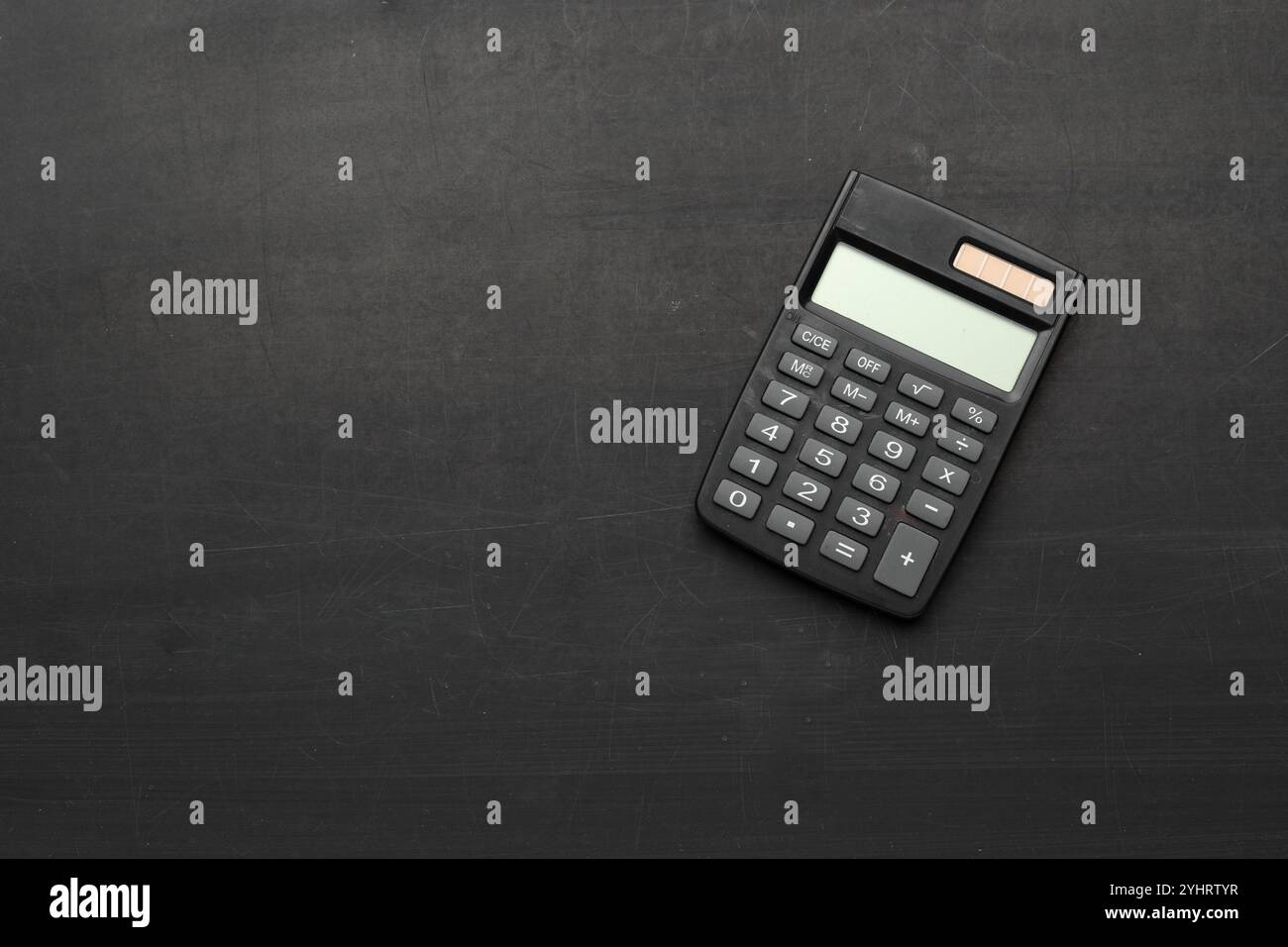 desk table with calculator Stock Photo - Alamy