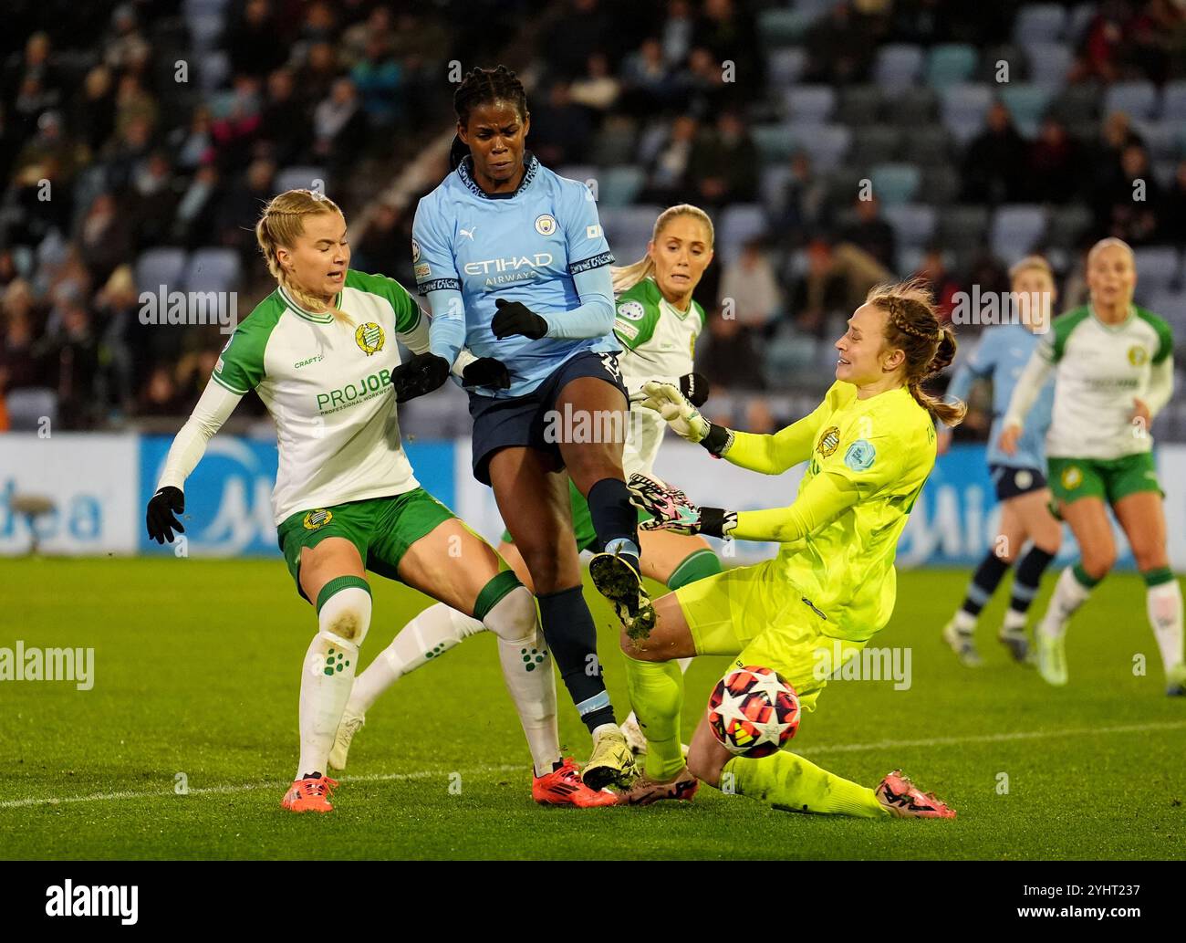 Manchester City's Khadija Shaw (centre) is challenged by Hammaby IF's ...