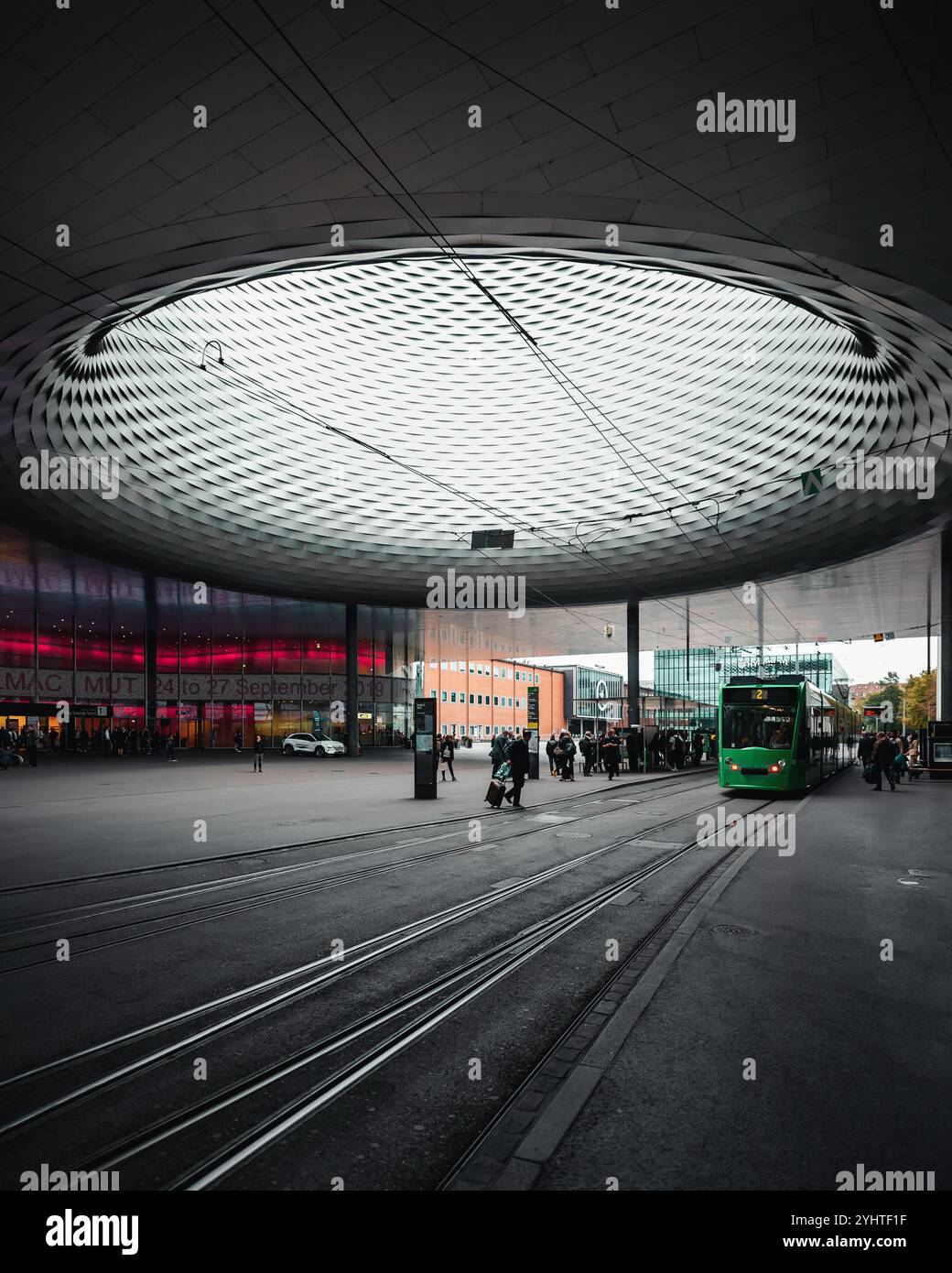 Messeplatz tram stop in Basel. Circular opening in the modern building ...