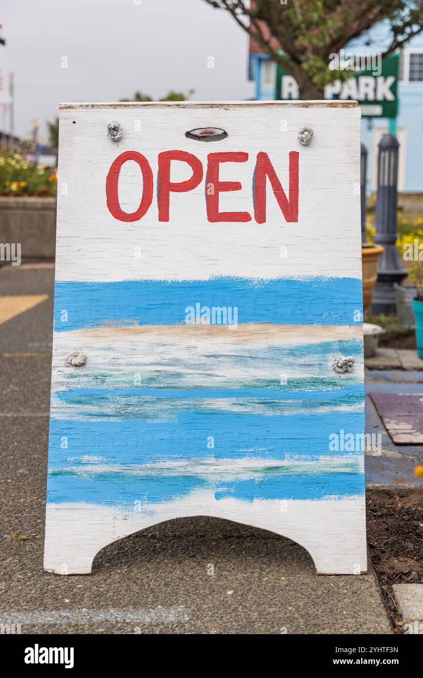 North America, USA, Washington State, Long Beach. Open sign with a ...