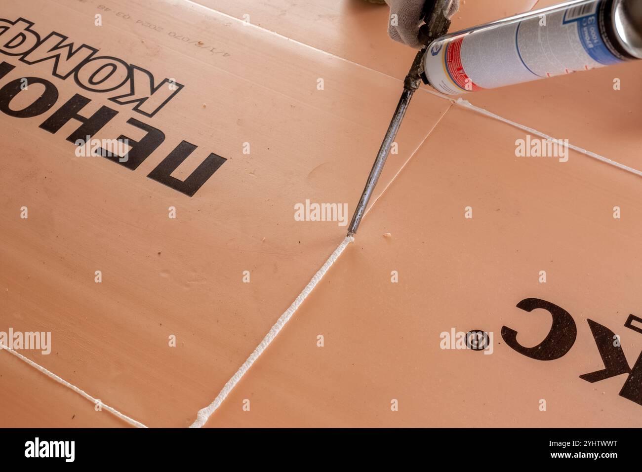 Sealing of seams of polyurethane boards Penoplex with mounting foam ...