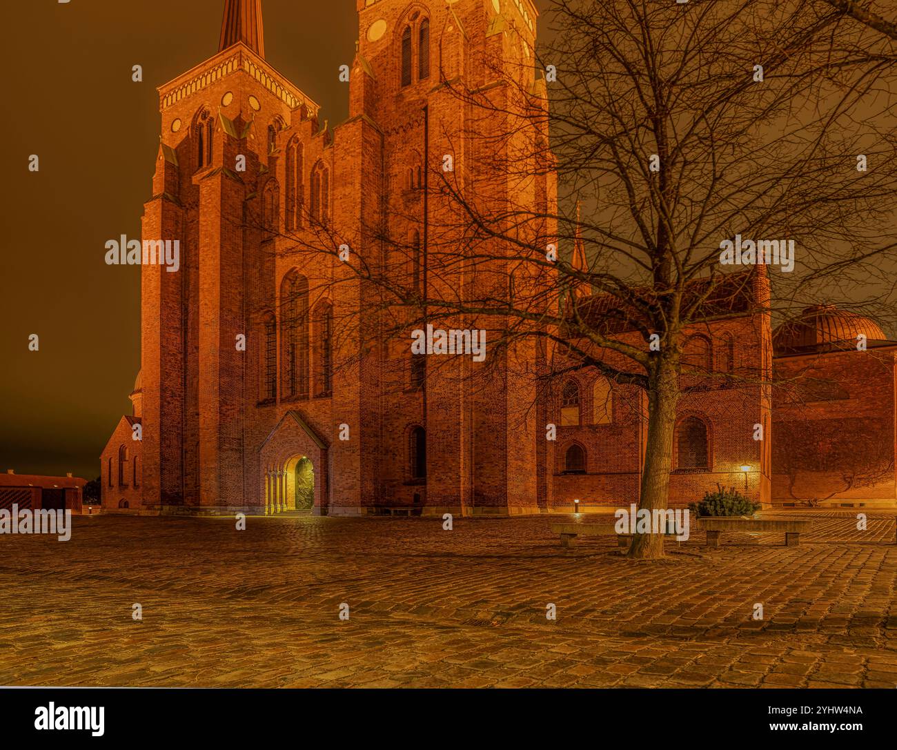 roskilde cathedral and its two towers in a soft light at night, Denmark ...
