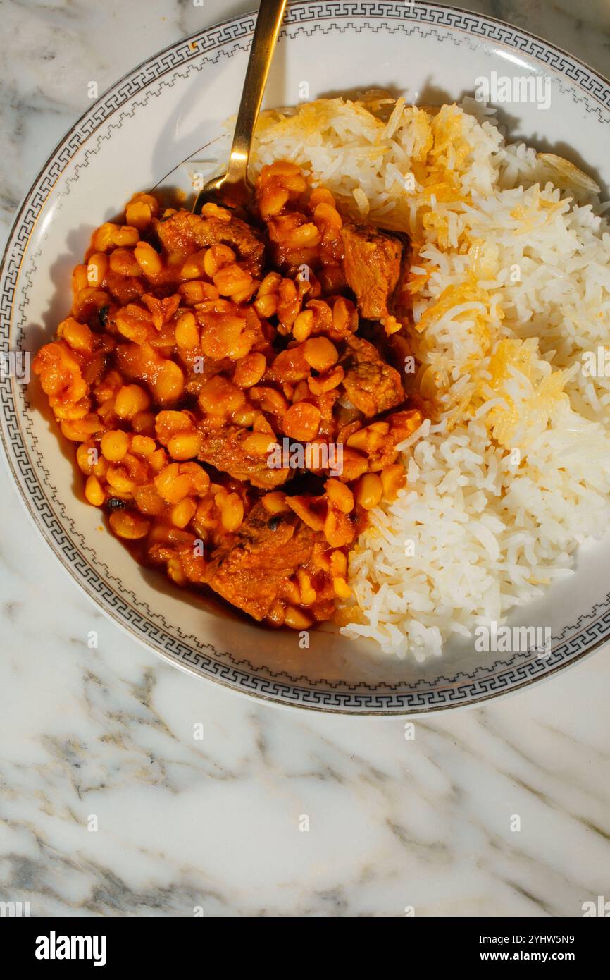 serving of Khoresh Gheymeh, Persian yellow split pea and beef stew with ...