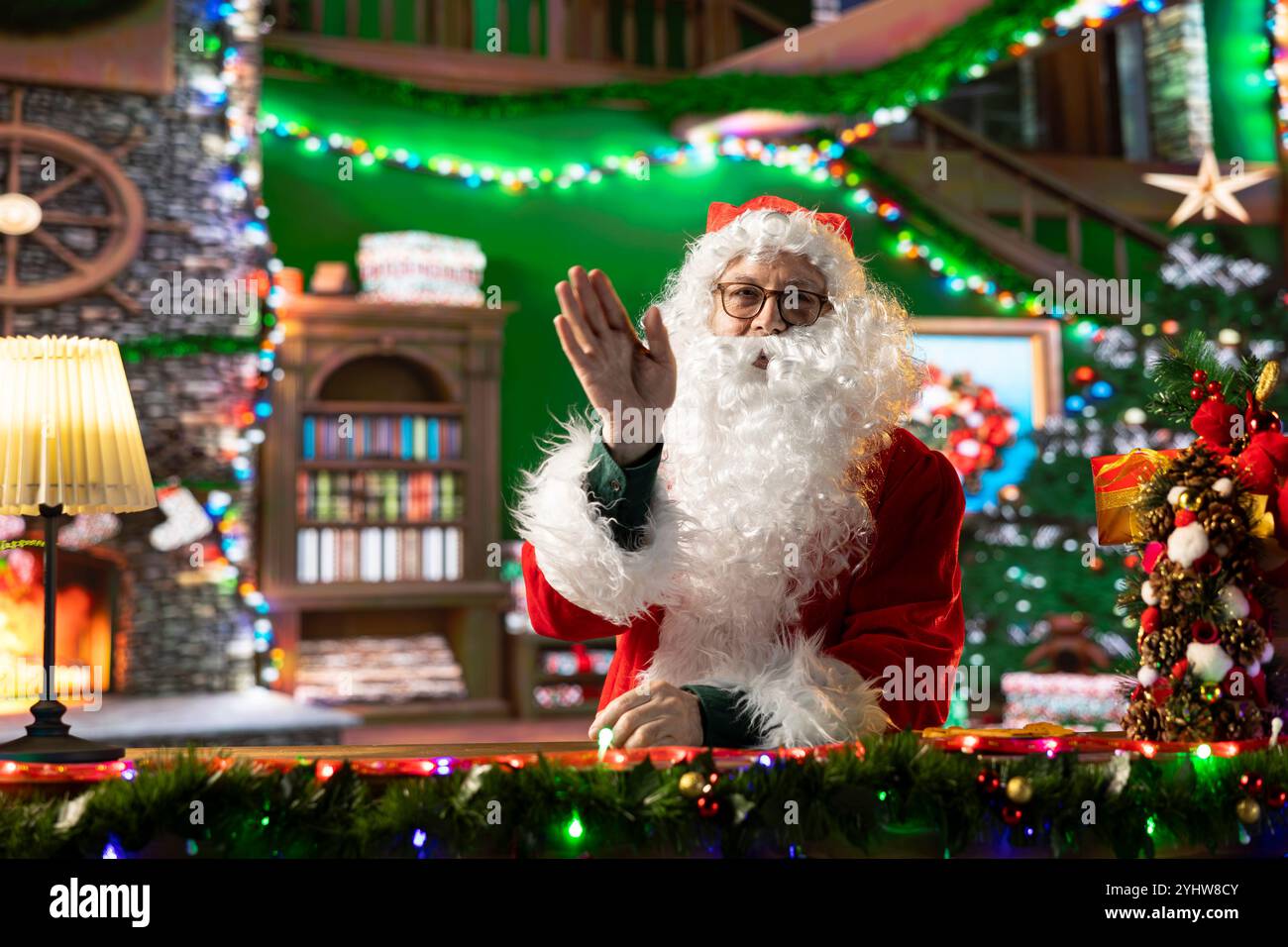 POV of Father Christmas waving and chatting with people on video call ...