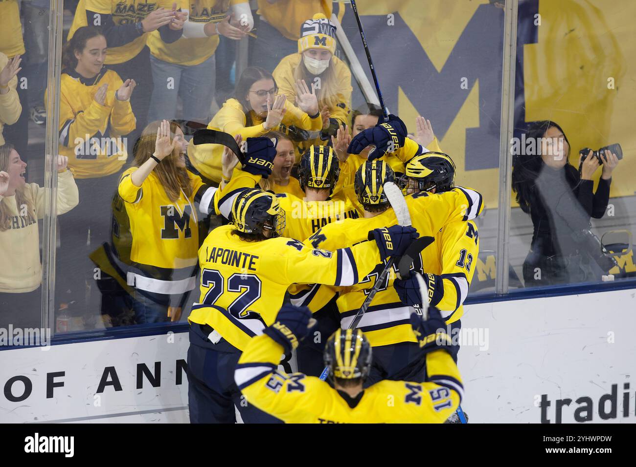 Michigan players and fans celebrate a goal by Jackson Hallum, center ...