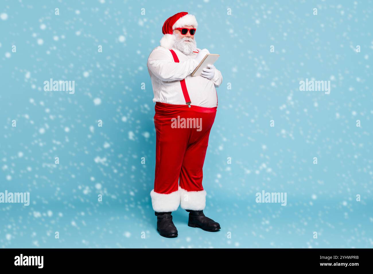 Full length photo of funny funky fat santa claus in hipster eyeglasses ...