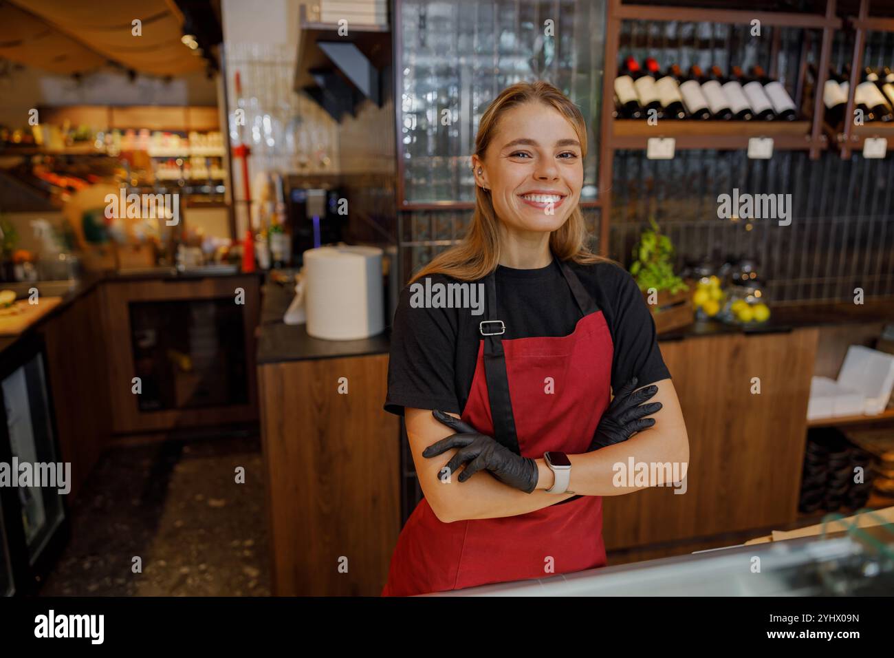 Happy Barista in a Cozy Caf Setting Stock Photo - Alamy