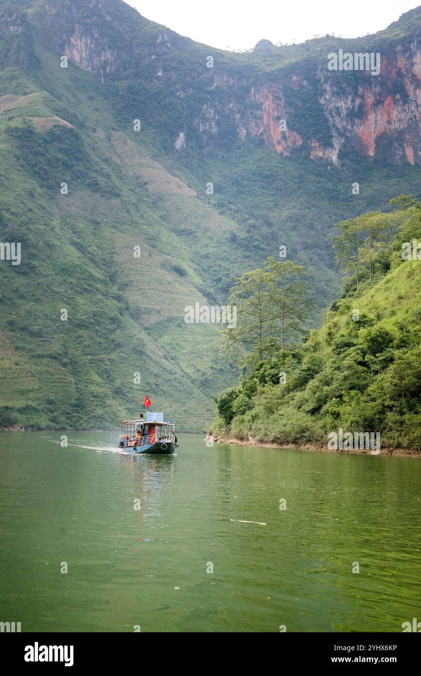 A boat on the Nho Que River in Ha Giang Province, Vietnam. The river ...