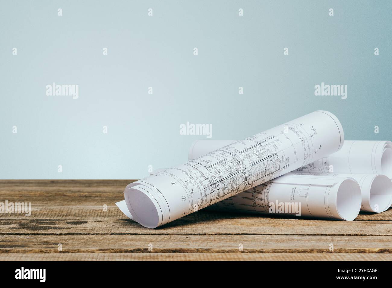Architectural blueprints on a table close up Stock Photo - Alamy