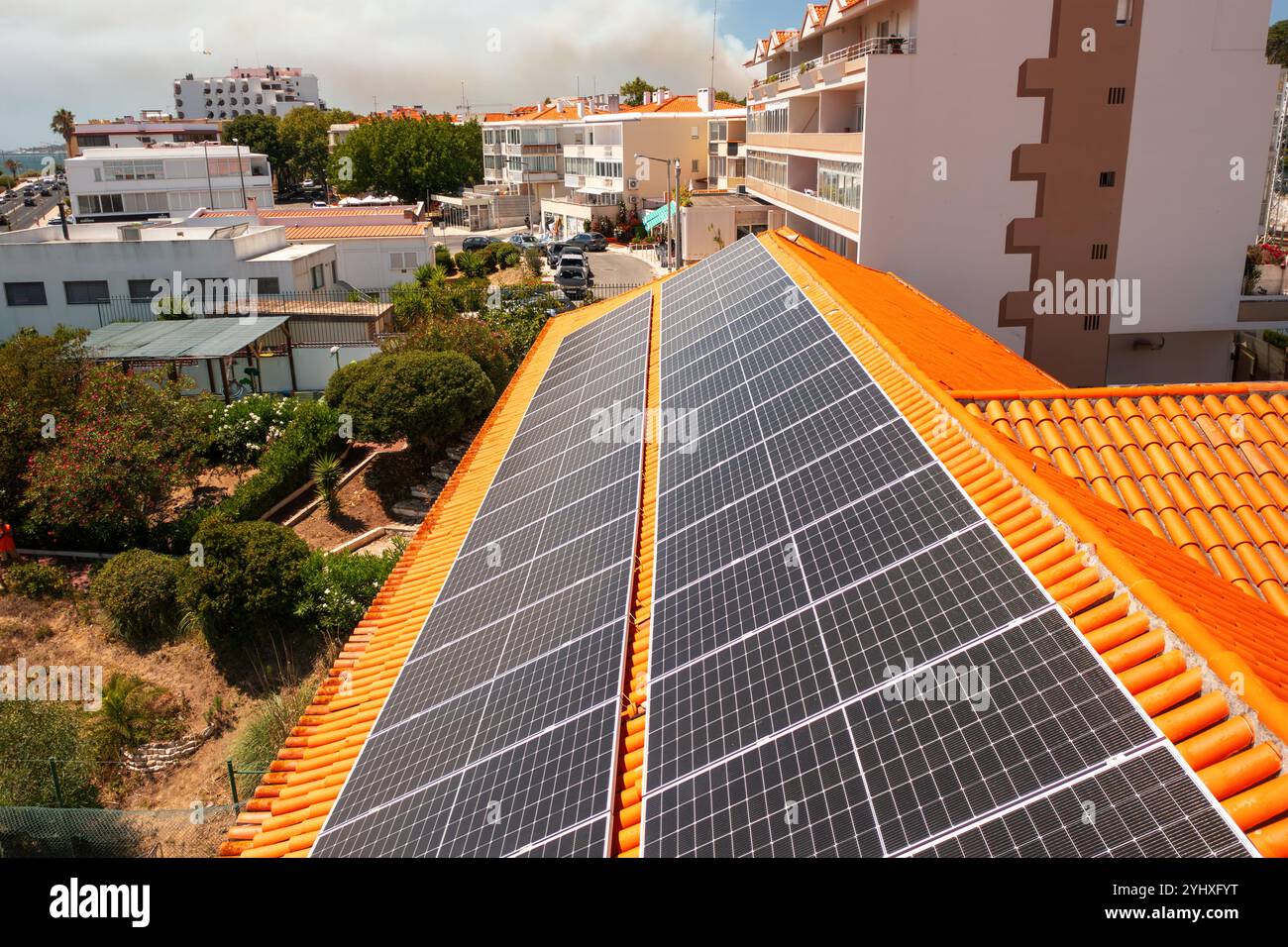 aerial view solar panels on house rooftop in city. Residential ...