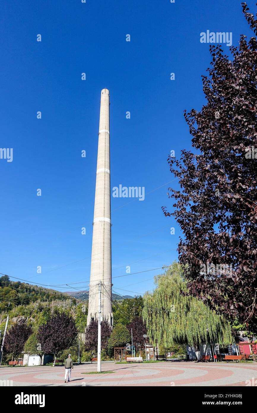 Tall industrial chimney in Lupeni, former mining town, in the Jiu ...