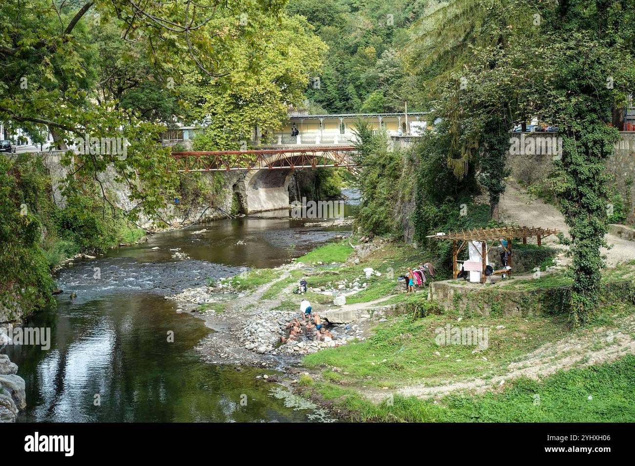 A group of locals bath in the hot springs of Băile Herculane, Romania ...