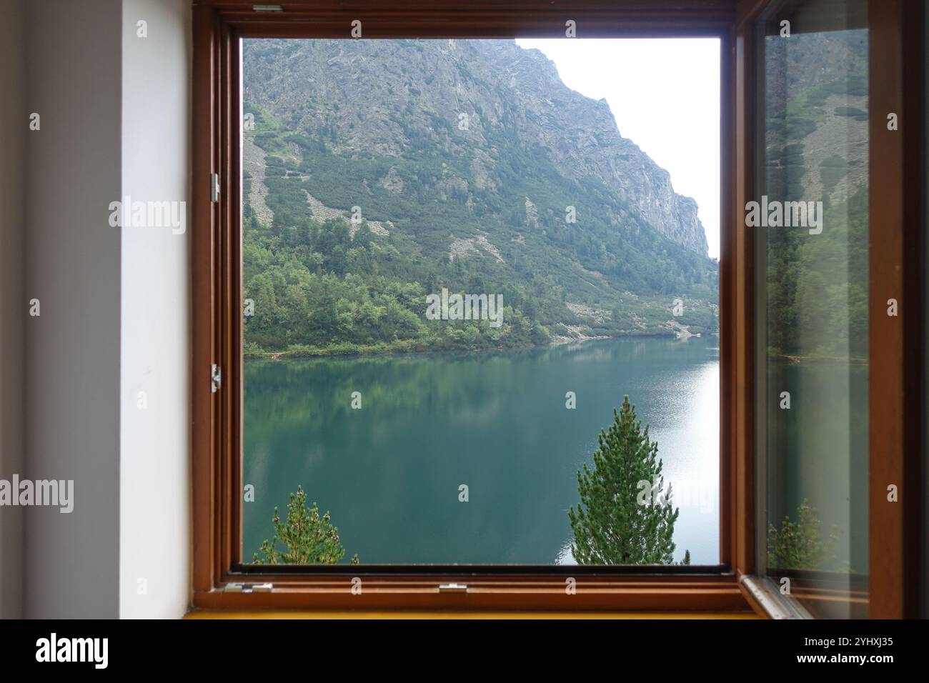 Scenic view of Popradské pleso lake, Slovakia, surrounded by mountains ...