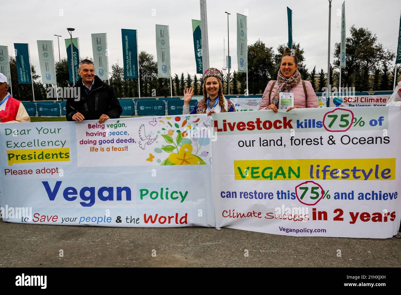 Vegan protesters demonstrate in front of an entrance of COP29, UN ...