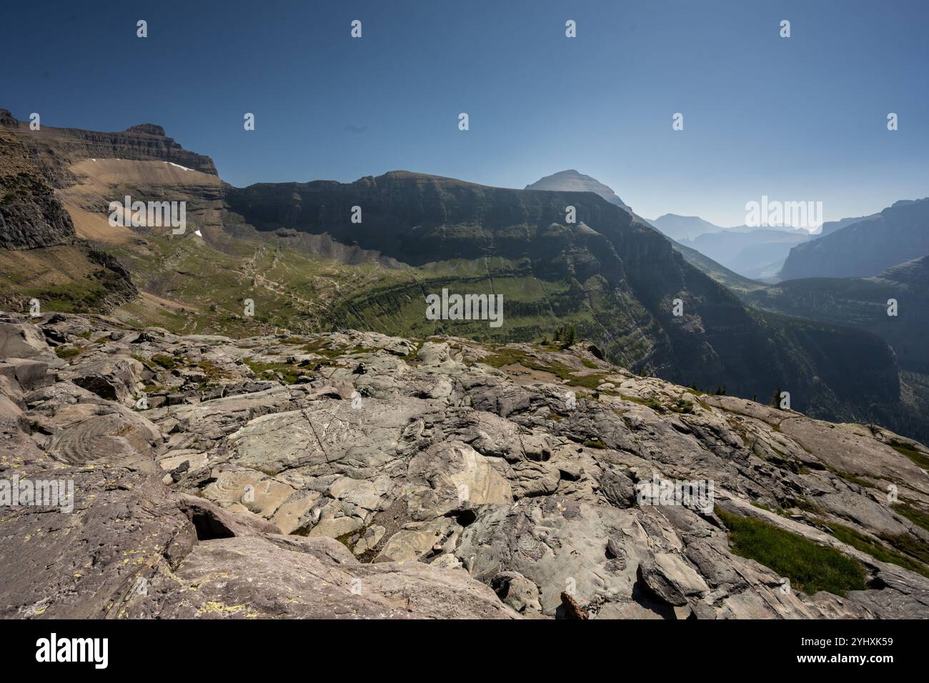 Smooth Boulders Overlook The Hole In The Wall In Glacier National Park ...