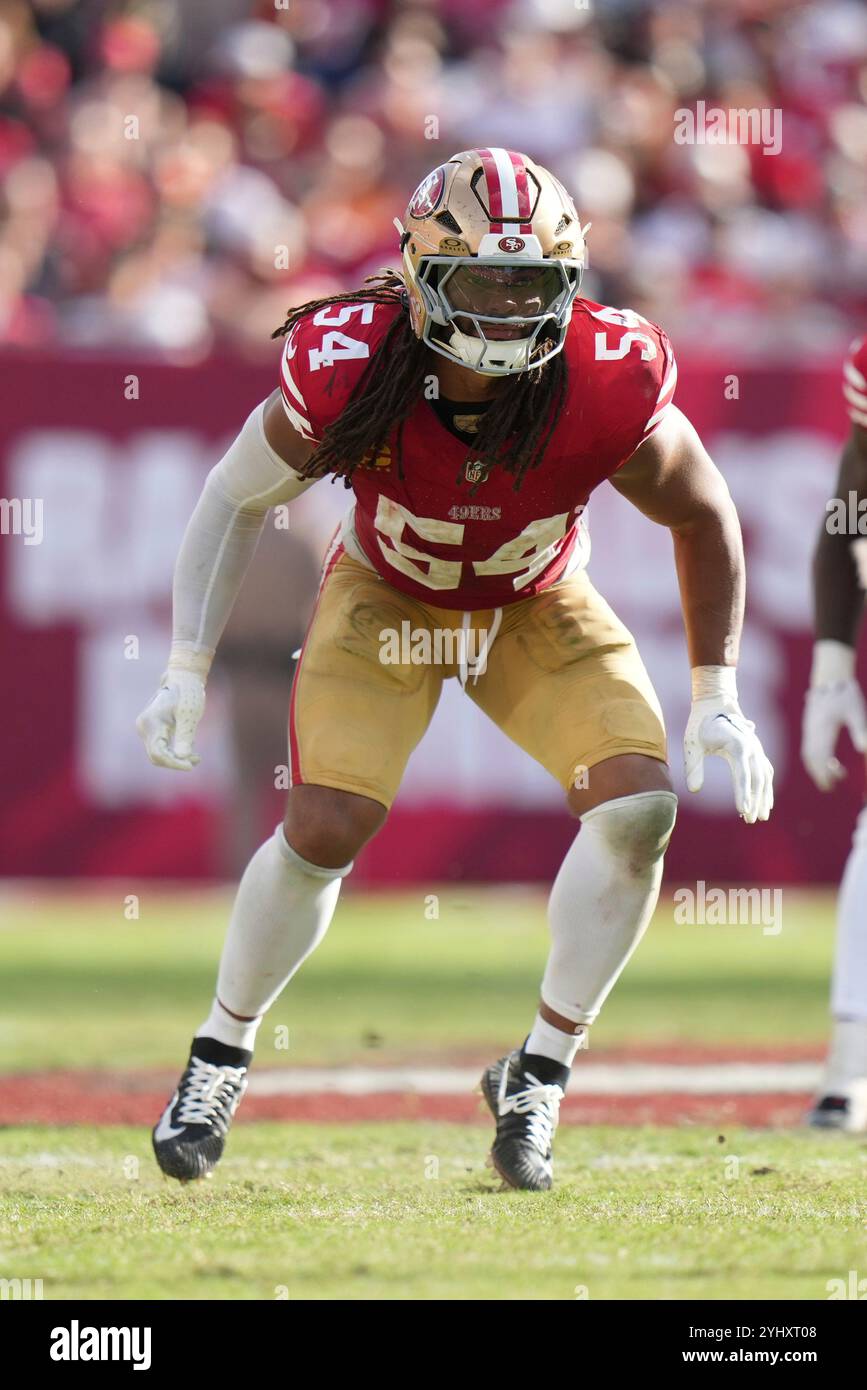 San Francisco 49ers linebacker Fred Warner (54) eyes the passer as he ...