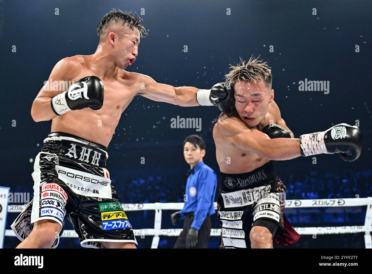 Tokyo, Japan. 13th Oct, 2024. Champion Takuma Inoue, left, hits ...