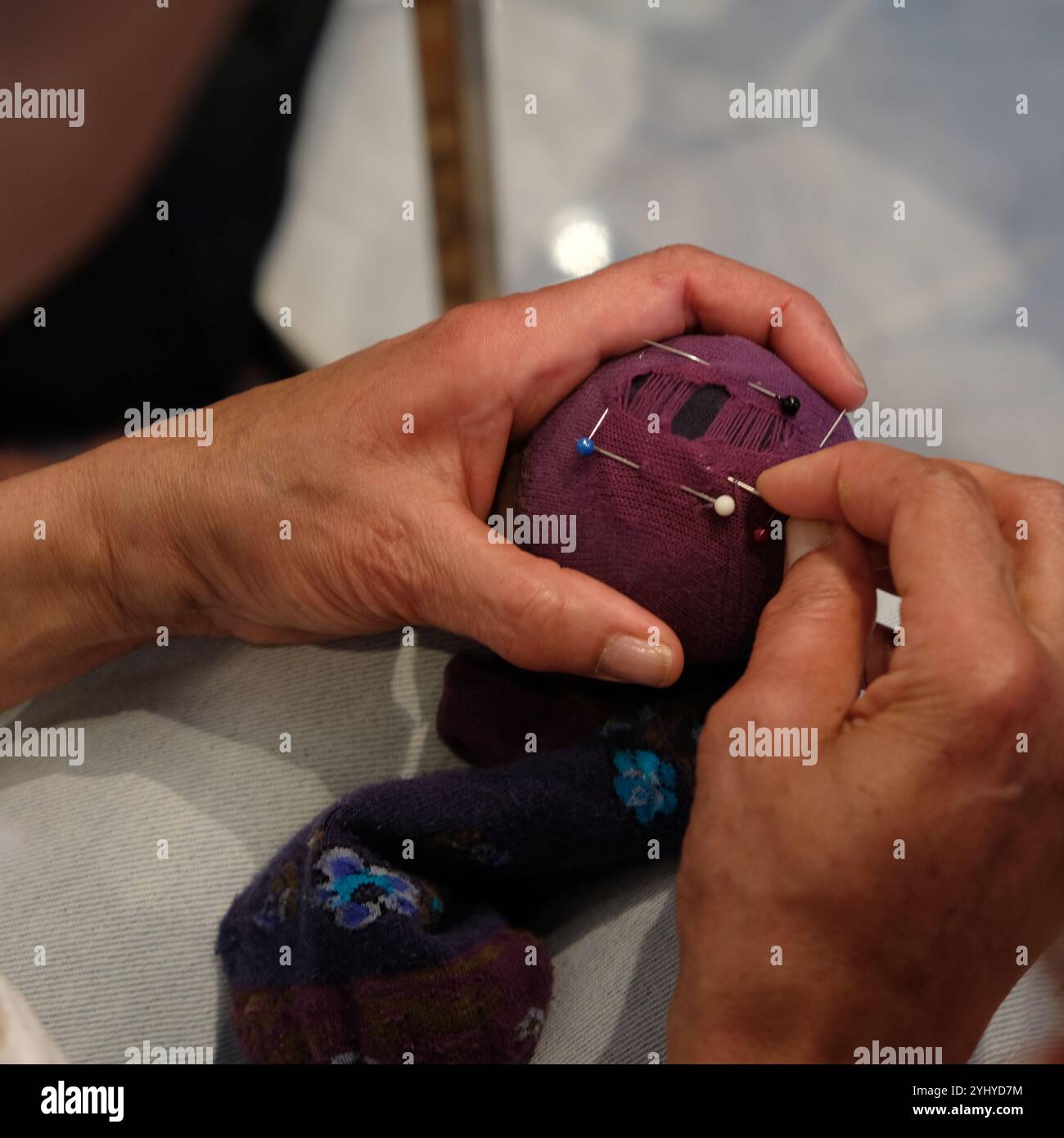 Darning socks hi-res stock photography and images - Alamy