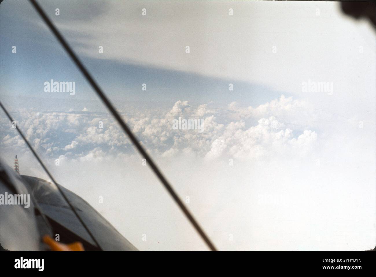 F-106A pilot eye view of clouds formations through right side of flat ...