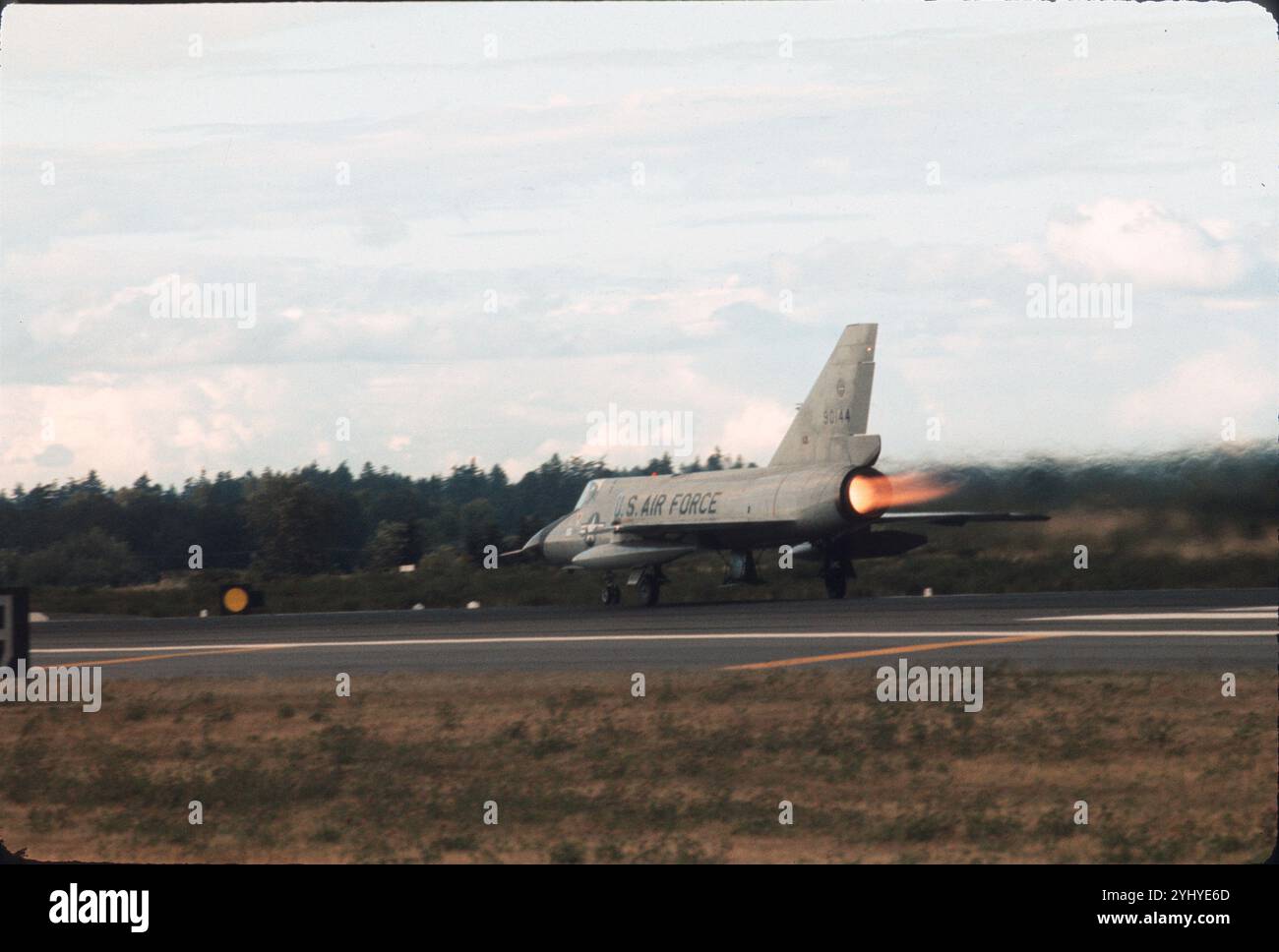 Pratt & Whitney J-75 afterburner makes a torch behind this 318th F-106A ...