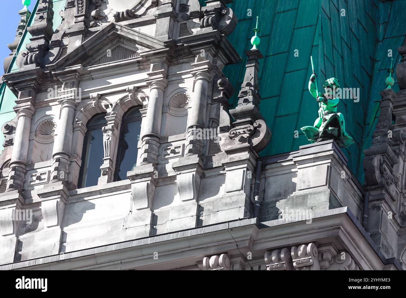 Details of town hall in Hamburg, Germany. Towering structure with a ...