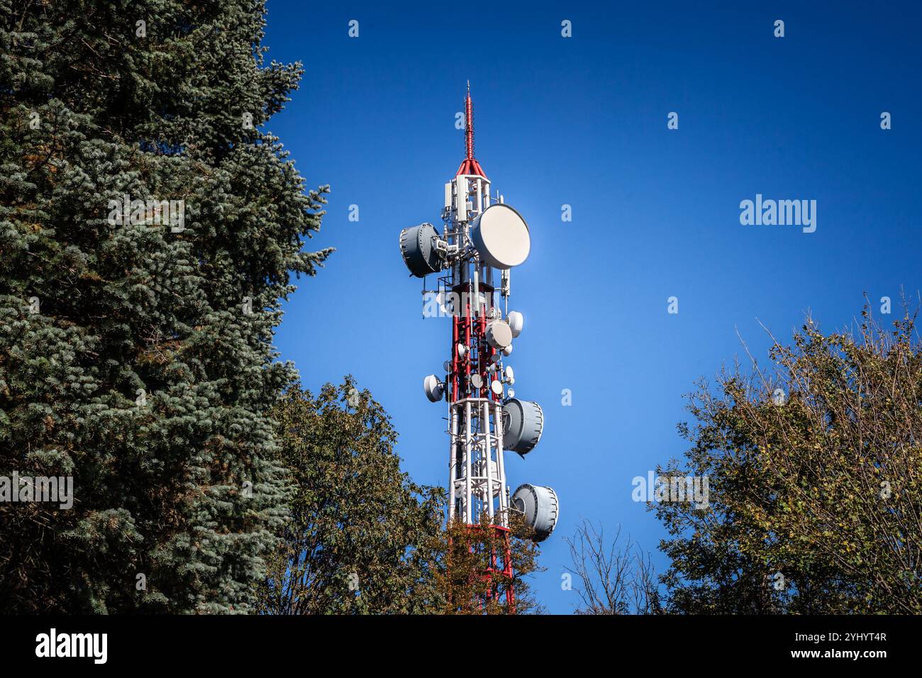 Mobile phone base station, equipped with 3G, 4G and 5G antenna, at top ...