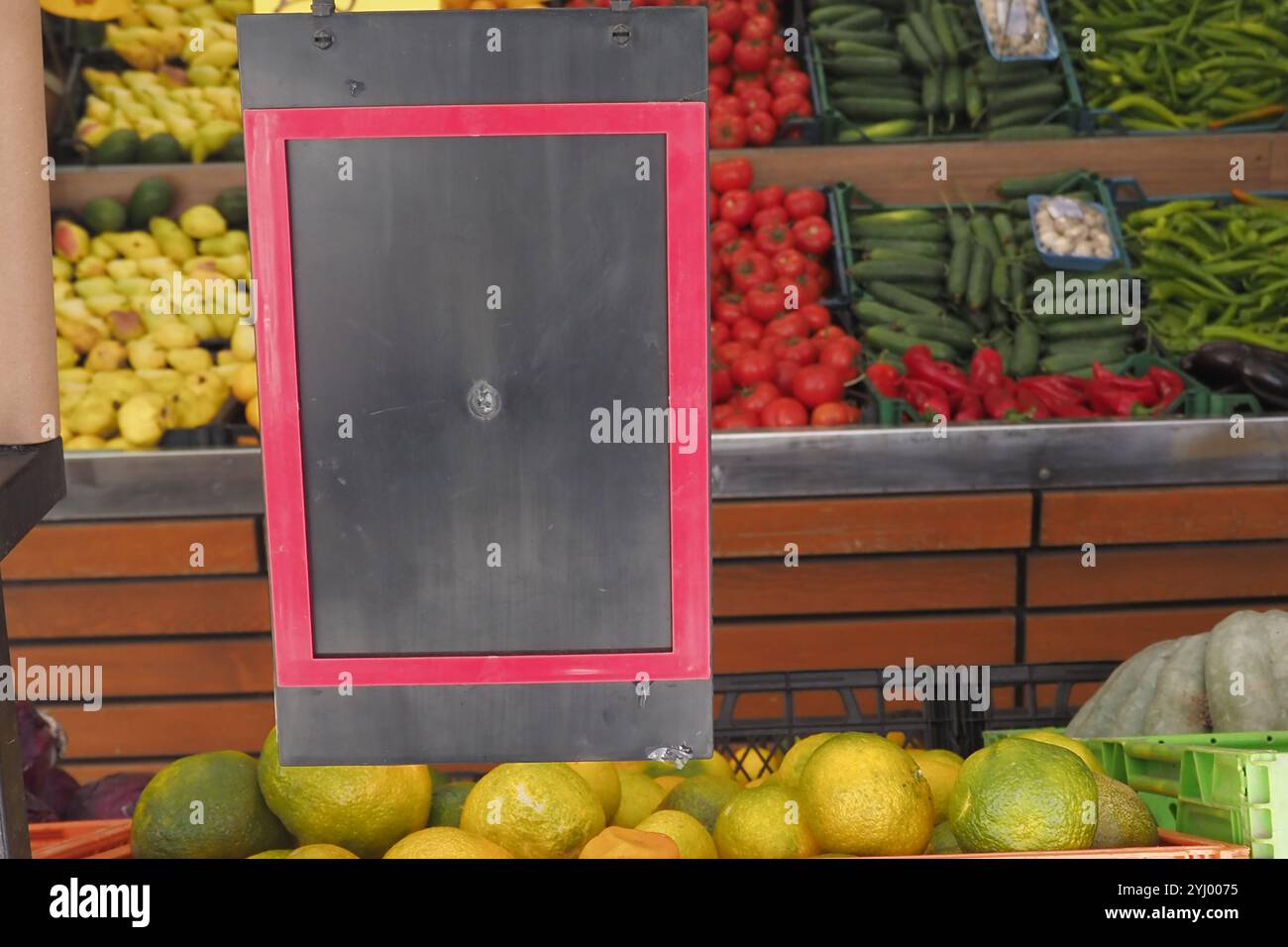 A Fresh Produce Display in a Grocery Store Featuring an Empty Sign with ...