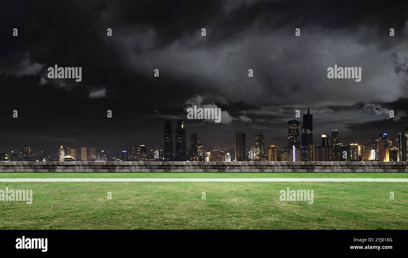 Empty football field with pitch line on green grass with cityscapes ...