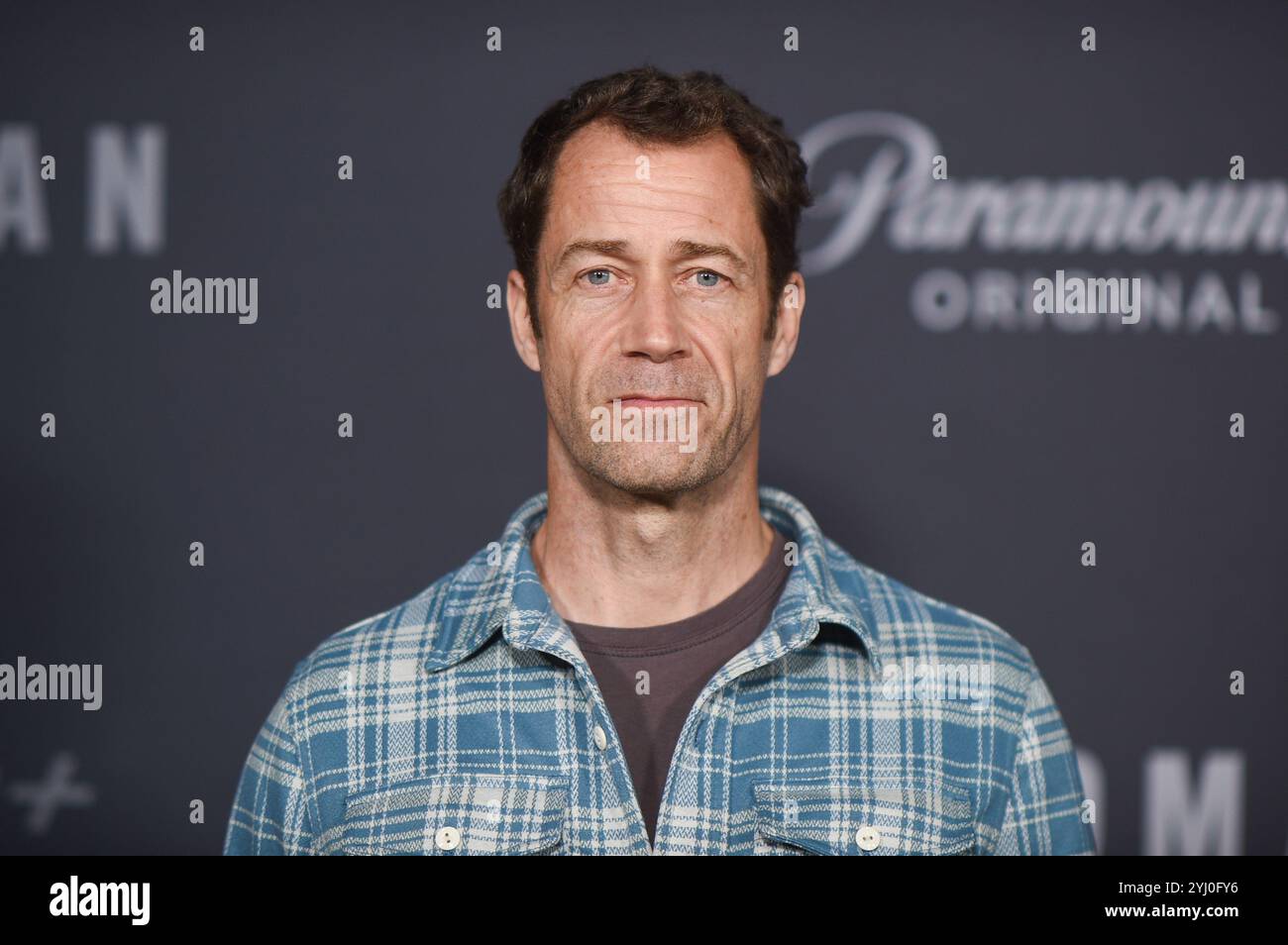 Colin Ferguson arrives at the premiere of "Landman" on Tuesday, Nov. 12 ...
