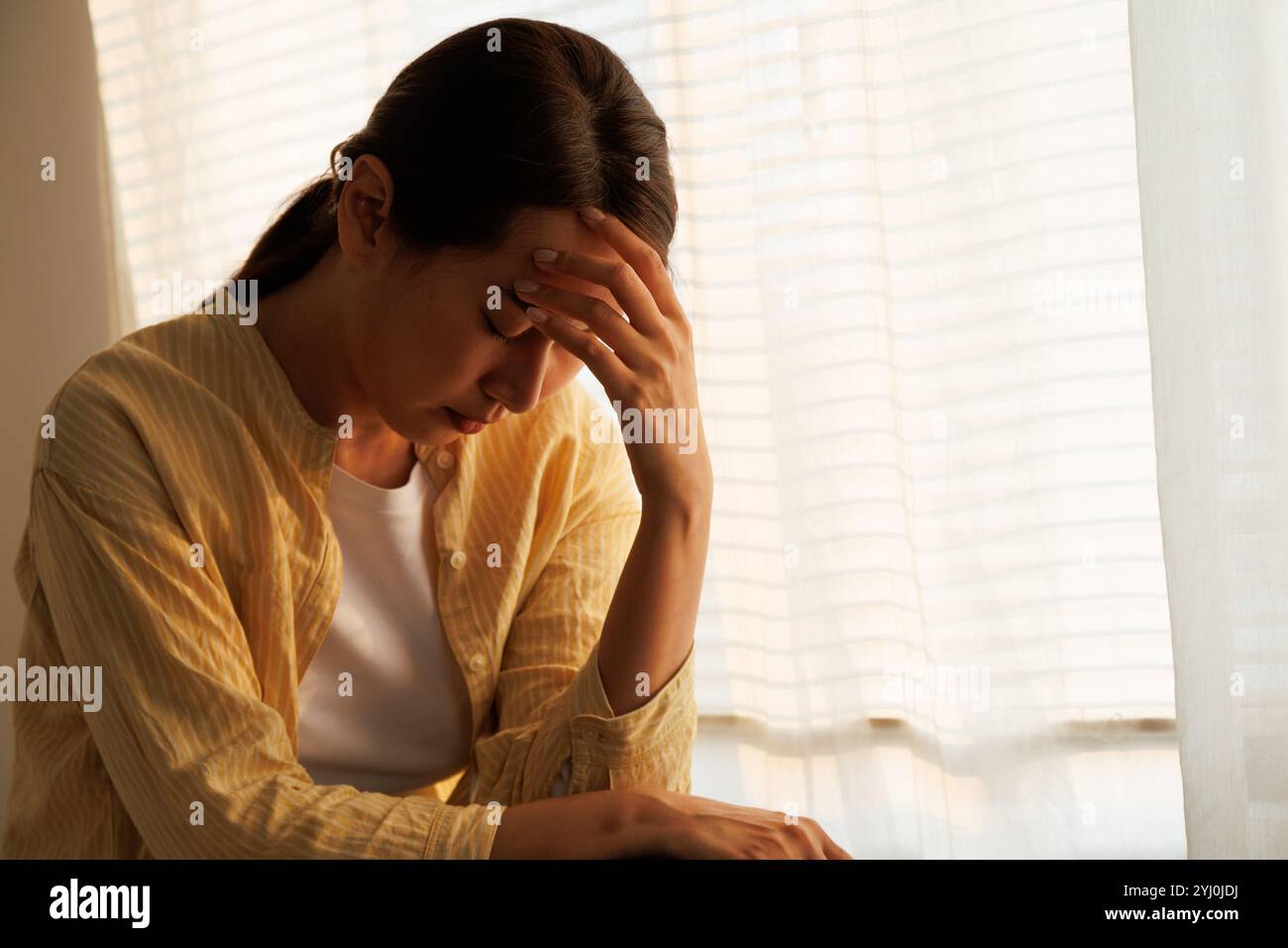 Depressed young asian woman with mental health problem in mind need ...