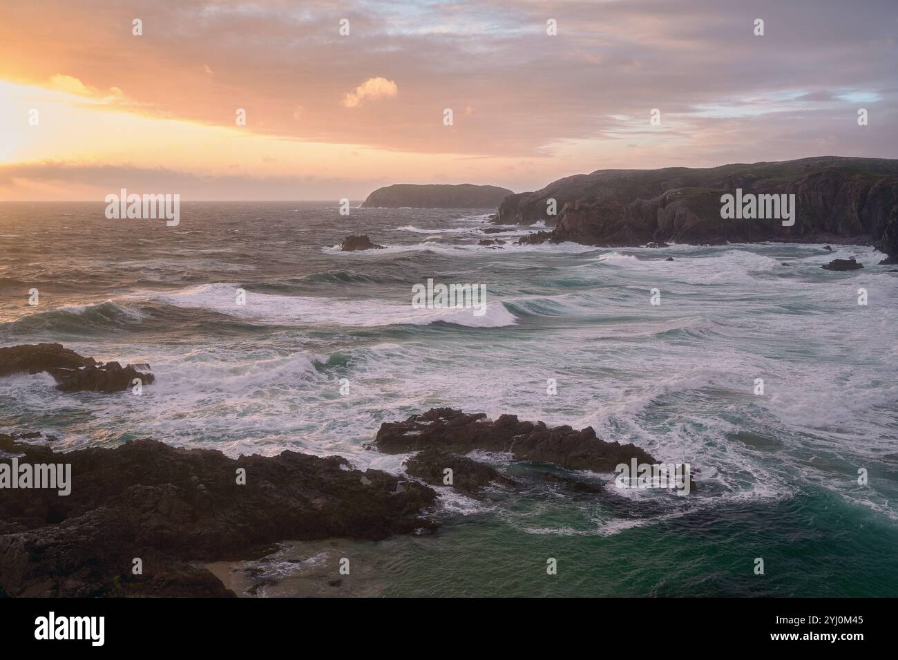 Stunning sunset over the sea at Mangersta beach on the Isle of Lewis in ...