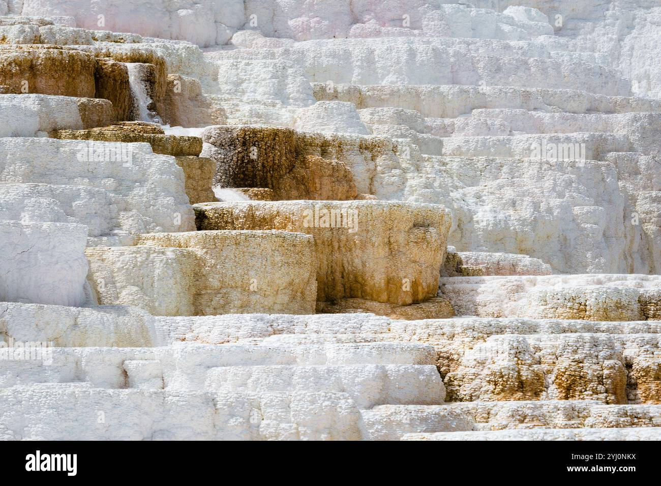 Pallette Spring pouring over calcium carbonate buildup, Yellowstone ...
