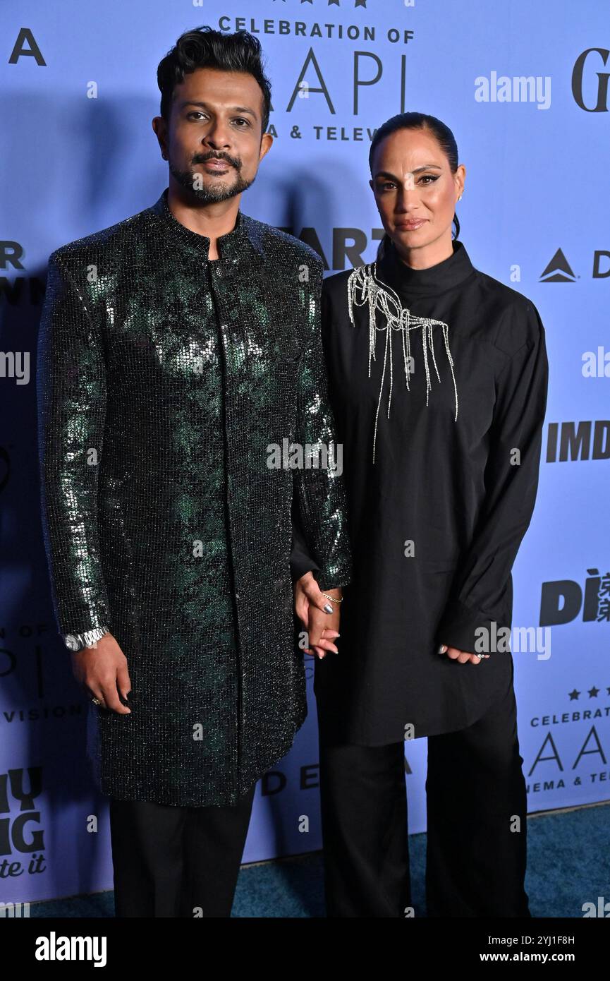 Hollywood CA USA - November 12, 2024: Utkarsh Ambudkar, Naomi Ambudkar ...