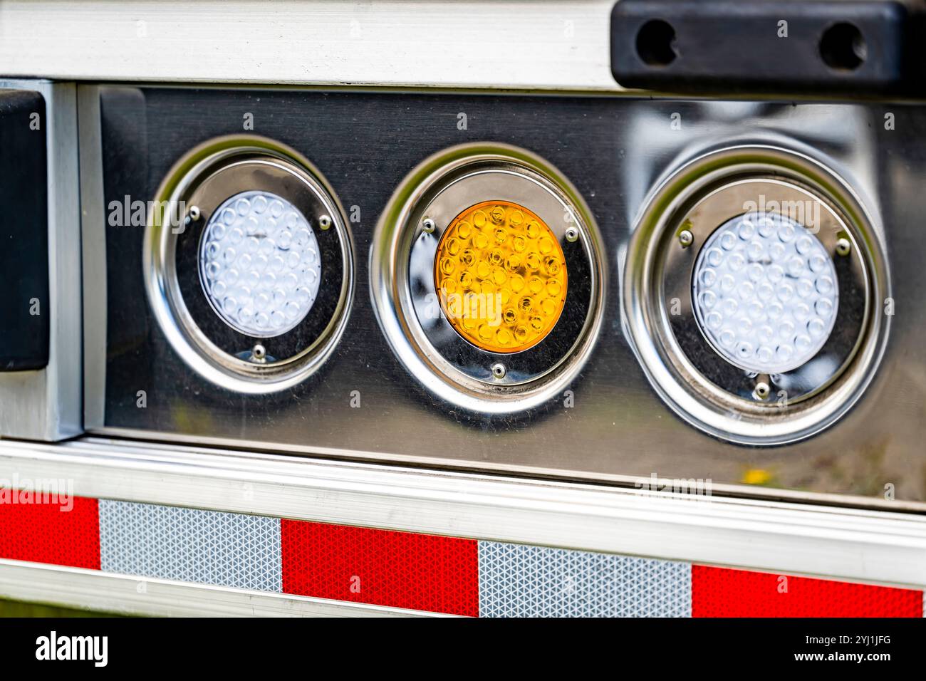 Powerful big rig semi truck standing with empty step deck semi trailer ...