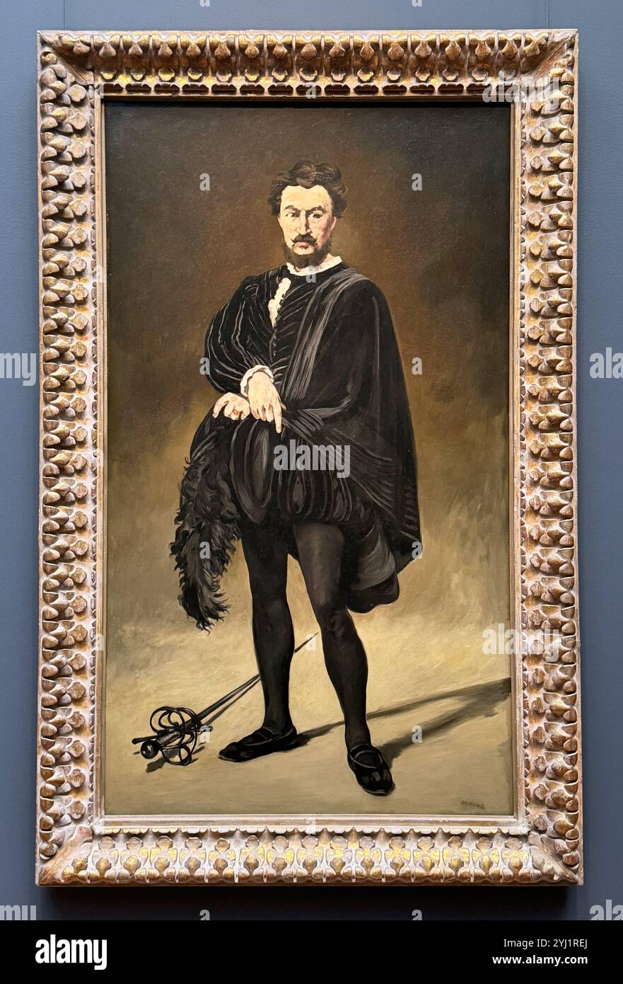 The Tragic Actor, portrait of a man in black costume, tights and sword ...