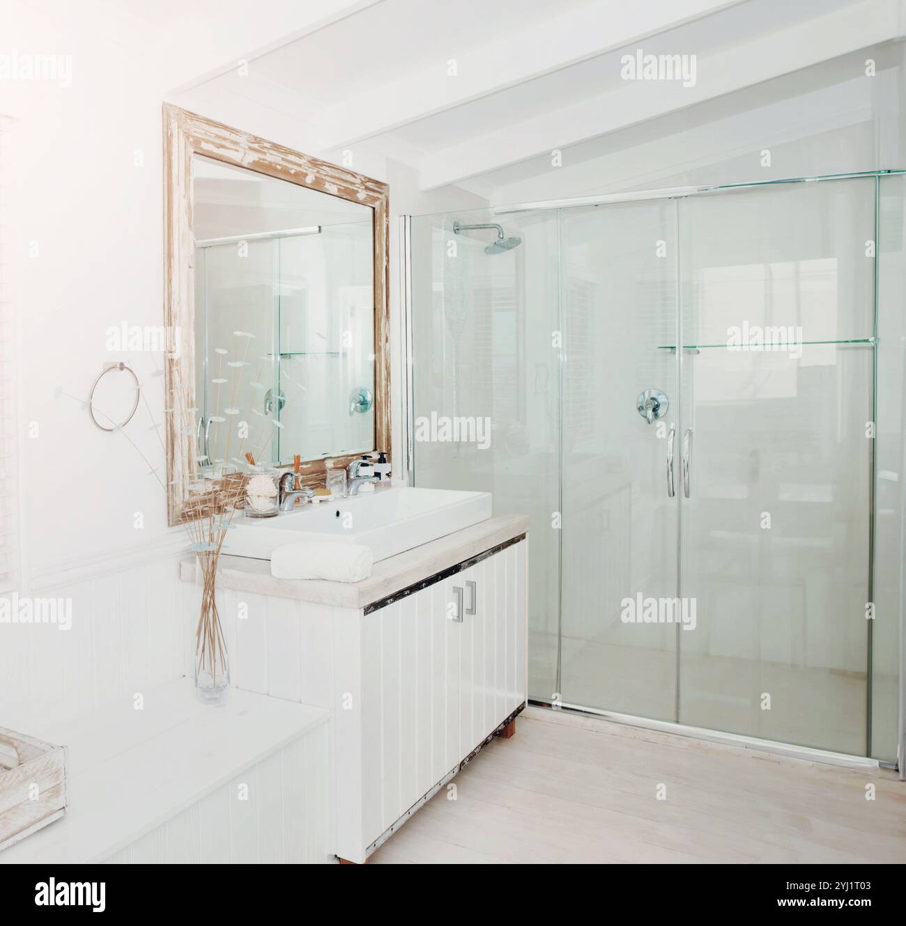 Empty bathroom, home and shower with cabinet, basin and interior design ...