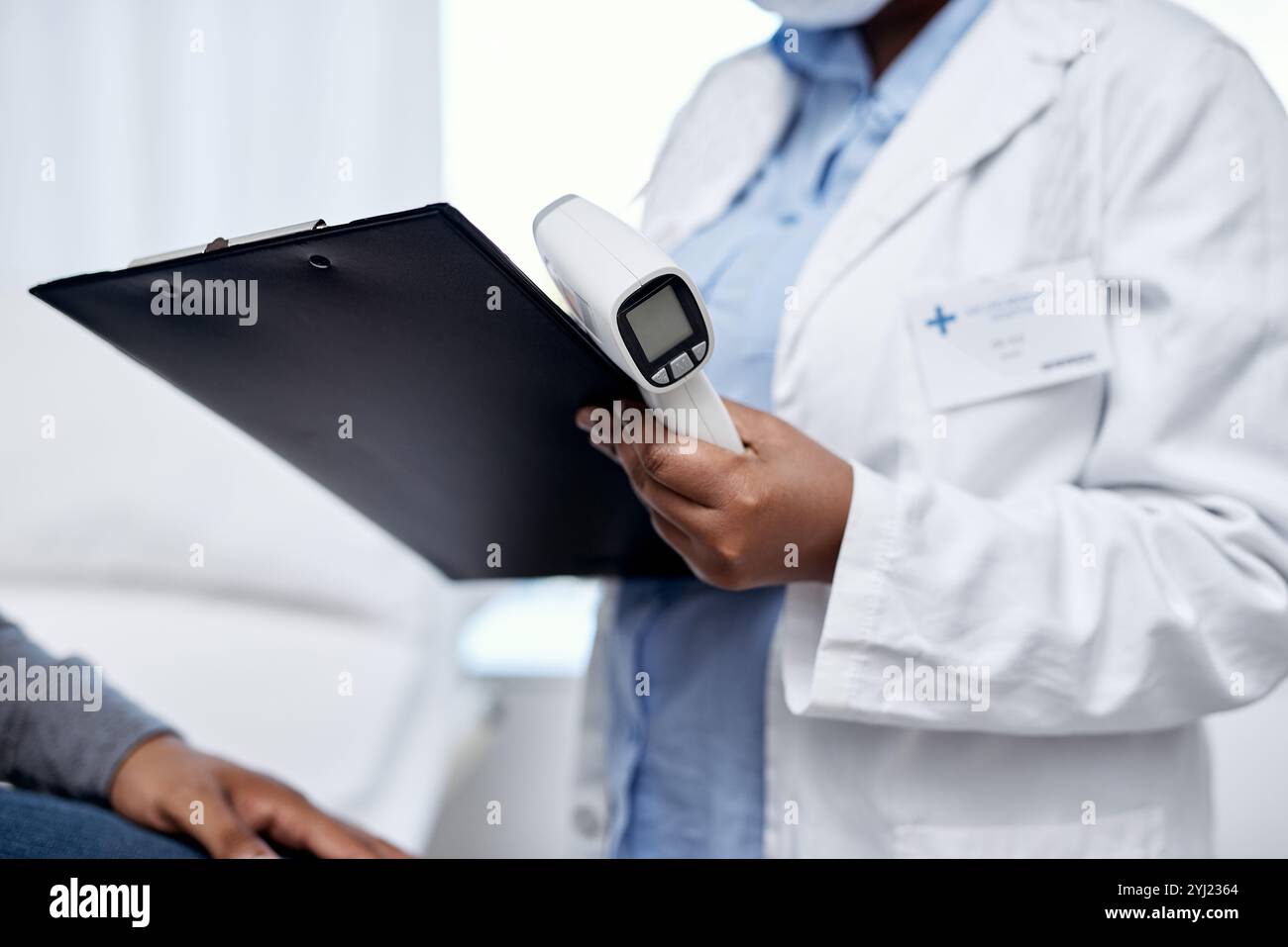 Hands, doctor and clipboard with thermometer for patient to record ...