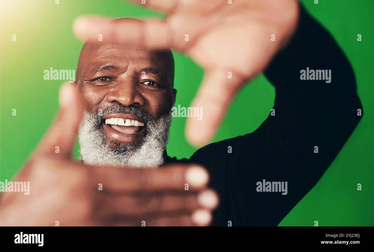 Senior black man, hand frame and studio portrait with smile, excited ...