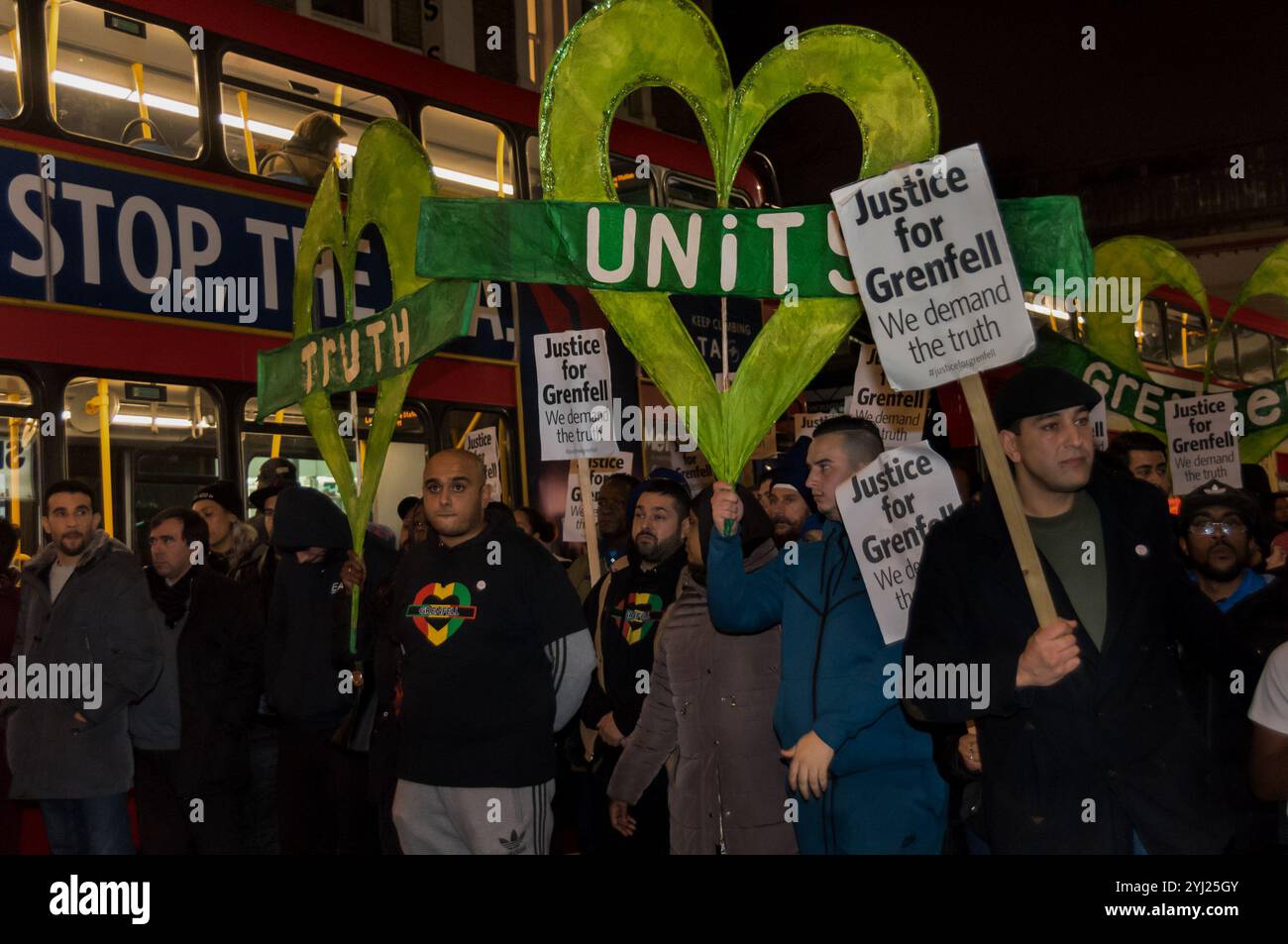 London, UK. 14th November 2017. Marchers with posters and banners on ...