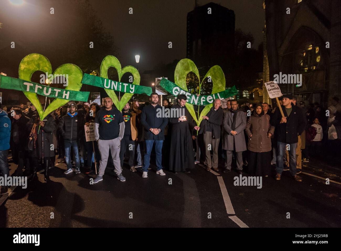 London, UK. 14th November 2017. Marchers with posters and banners on ...