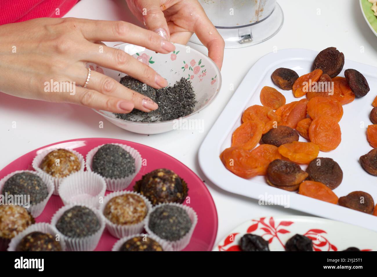 Woman makes delicious sweets hi-res stock photography and images - Alamy
