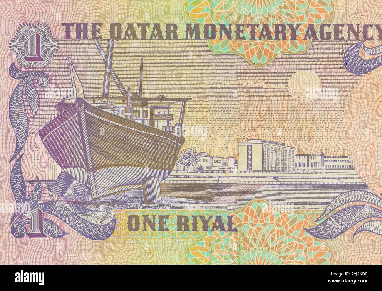 Portrait of beached boat, harbour landmark and emir's palace from Qatar ...