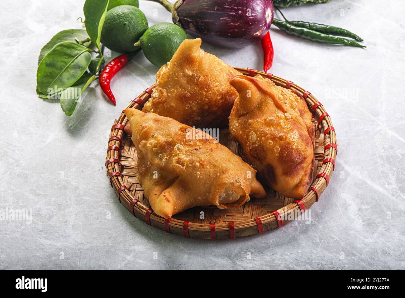 Indian cuisine - fries crispy stuffed samosa Stock Photo - Alamy