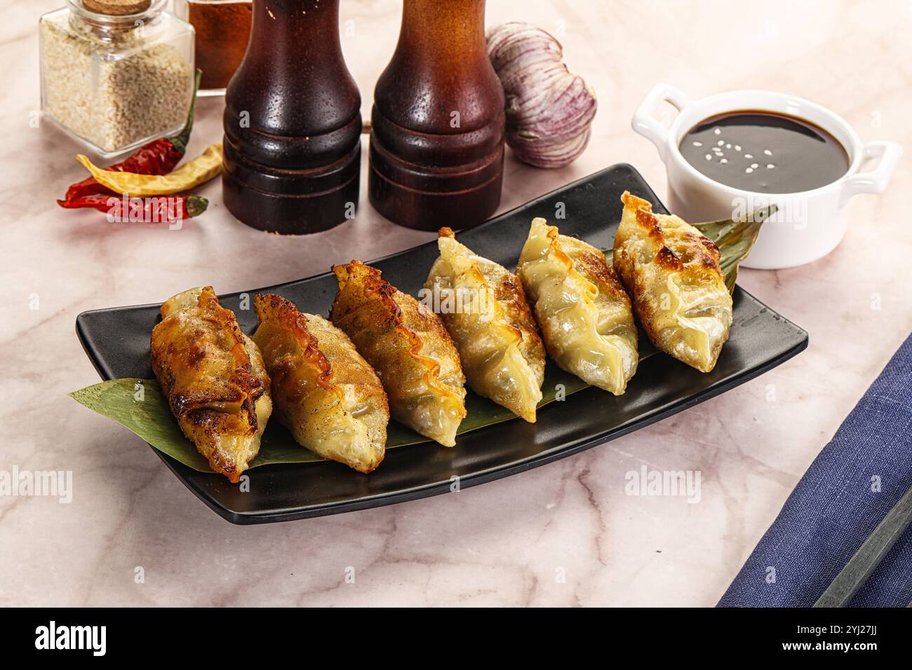 Fried Japanese stuffed dumplings - Gyoza with meat Stock Photo - Alamy
